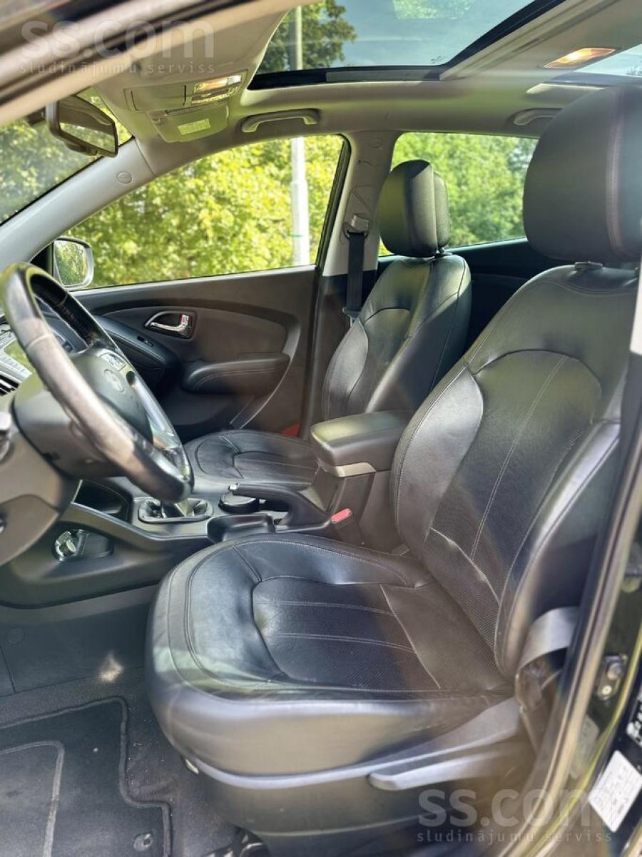 Melns Hyundai ix35 2010 Talsi, ar dzinēja tilpumu 2.00 L un nobraukumu 227 tūkst. km par 5970 €, foto 10 vietnē AUTOMOTO.COM.LV