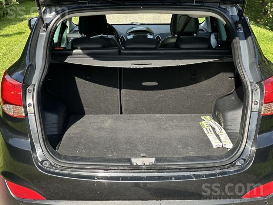 Melns Hyundai ix35 2010 Talsi, ar dzinēja tilpumu 2.00 L un nobraukumu 227 tūkst. km par 5970 €, foto 14 vietnē AUTOMOTO.COM.LV