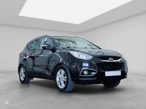 Black Hyundai ix35 2010 in Kaunas, with an engine capacity of 2.00 L and mileage of 289 thousand km for 5490 €, photo 9 on AUTOMOTO.COM.LV