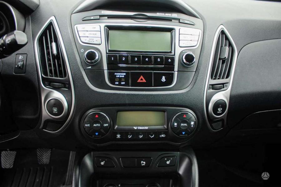 Black Hyundai ix35 2010 in Kaunas, with an engine capacity of 2.00 L and mileage of 289 thousand km for 5490 €, photo 14 on AUTOMOTO.COM.LV