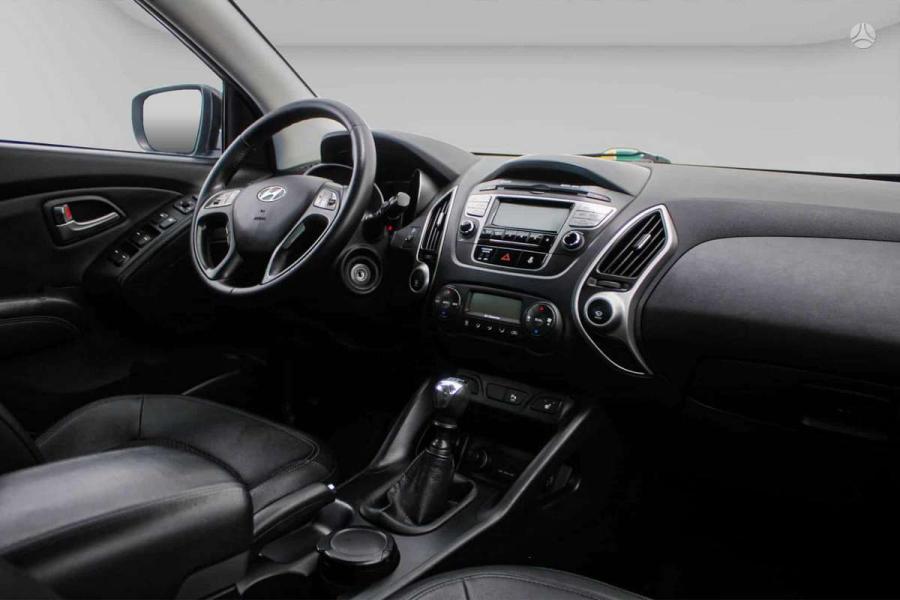 Black Hyundai ix35 2010 in Kaunas, with an engine capacity of 2.00 L and mileage of 289 thousand km for 5490 €, photo 15 on AUTOMOTO.COM.LV