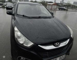 Black Hyundai ix35 2010 in Vilnius, with an engine capacity of 2.00 L and mileage of 279 thousand km for 3100 €, photo  on AUTOMOTO.COM.LV