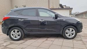 Black Hyundai ix35 2011 in Vilnius, with an engine capacity of 1.59 L and mileage of 138 thousand km for 5950 €, photo 31 on AUTOMOTO.COM.LV