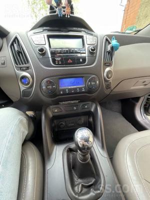Melns Hyundai ix35 2011 Jelgava, ar dzinēja tilpumu 2.00 L un nobraukumu 288 tūkst. km par 5100 €, foto 12 vietnē AUTOMOTO.COM.LV