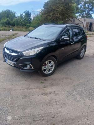 Black Hyundai ix35 2011 in Radviliskis, with an engine capacity of 1.69 L and mileage of 240 thousand km for 4200 €, photo 6 on AUTOMOTO.COM.LV