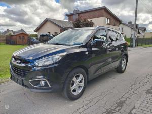 Black Hyundai ix35 2011 in Panevezys, with an engine capacity of 1.69 L and mileage of 265 thousand km for 5100 €, photo  on AUTOMOTO.COM.LV