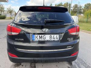 Black Hyundai ix35 2011 in Kaunas, with an engine capacity of 2.00 L and mileage of 385 thousand km for 3999 €, photo 7 on AUTOMOTO.COM.LV