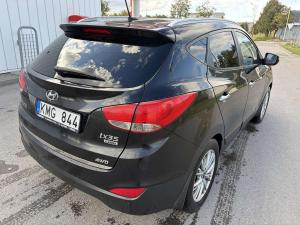 Black Hyundai ix35 2011 in Kaunas, with an engine capacity of 2.00 L and mileage of 385 thousand km for 3999 €, photo 8 on AUTOMOTO.COM.LV