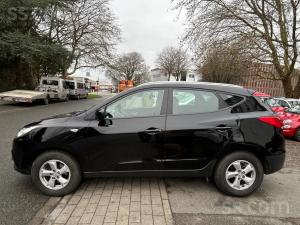 Black Hyundai ix35 2012 in Ogre, with an engine capacity of 1.70 L and mileage of 151 thousand km for 6995 €, photo 6 on AUTOMOTO.COM.LV