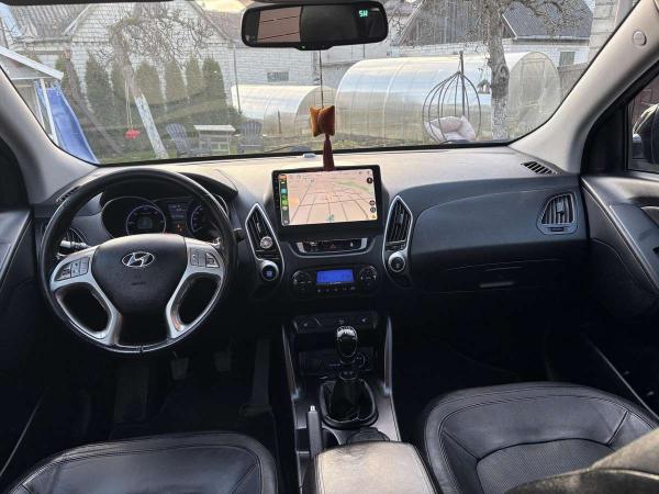 Melns Hyundai ix35 2012 Telšiai, ar dzinēja tilpumu 2.00 L un nobraukumu 197 tūkst. km par 5350 €, foto 7 vietnē AUTOMOTO.COM.LV