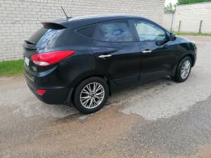 Melns Hyundai ix35 2012 Molėtai, ar dzinēja tilpumu 2.00 L un nobraukumu 379 tūkst. km par 3150 €, foto 7 vietnē AUTOMOTO.COM.LV