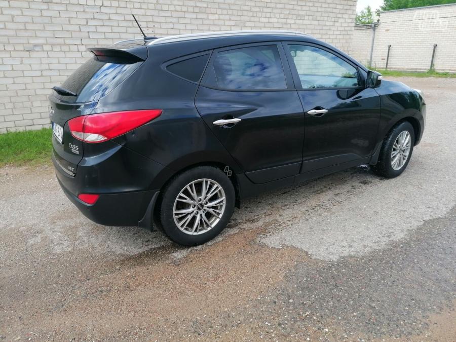 Melns Hyundai ix35 2012 Molėtai, ar dzinēja tilpumu 2.00 L un nobraukumu 379 tūkst. km par 3150 €, foto 7 vietnē AUTOMOTO.COM.LV