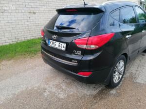 Melns Hyundai ix35 2012 Molėtai, ar dzinēja tilpumu 2.00 L un nobraukumu 379 tūkst. km par 3150 €, foto 8 vietnē AUTOMOTO.COM.LV