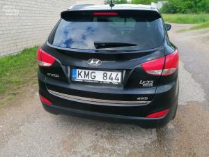 Melns Hyundai ix35 2012 Molėtai, ar dzinēja tilpumu 2.00 L un nobraukumu 379 tūkst. km par 3150 €, foto 9 vietnē AUTOMOTO.COM.LV