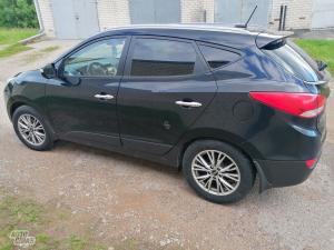 Melns Hyundai ix35 2012 Molėtai, ar dzinēja tilpumu 2.00 L un nobraukumu 379 tūkst. km par 3150 €, foto 11 vietnē AUTOMOTO.COM.LV