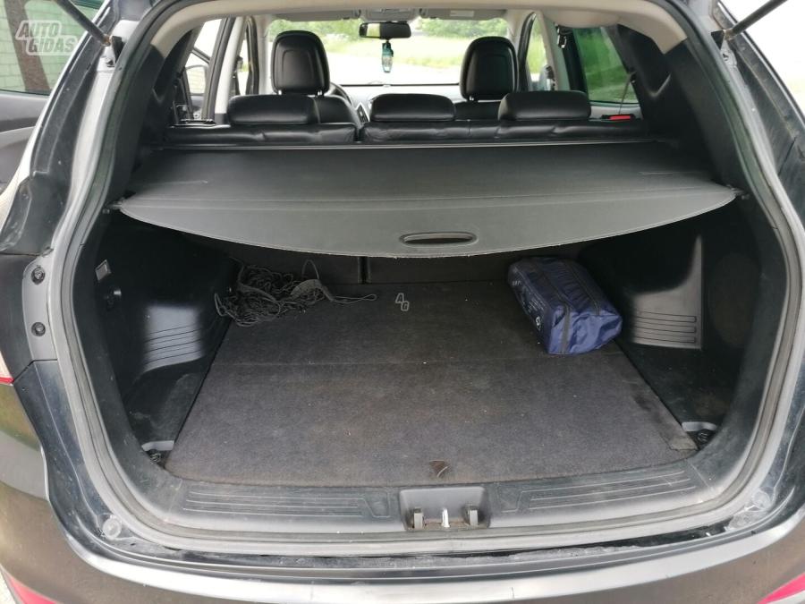 Melns Hyundai ix35 2012 Molėtai, ar dzinēja tilpumu 2.00 L un nobraukumu 379 tūkst. km par 3150 €, foto 20 vietnē AUTOMOTO.COM.LV