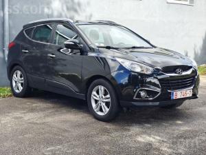 Melns Hyundai ix35 2012 Ogre, ar dzinēja tilpumu 2.00 L un nobraukumu 218 tūkst. km par 7270 €, foto  vietnē AUTOMOTO.COM.LV