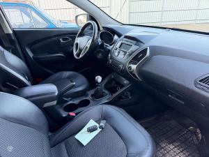 Black Hyundai ix35 2012 in Siauliai, with an engine capacity of 1.69 L and mileage of 400 thousand km for 2000 €, photo 12 on AUTOMOTO.COM.LV