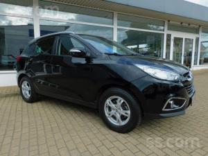 Black Hyundai ix35 2012 in Ogre, with an engine capacity of 2.00 L and mileage of 150 thousand km for 6699 €, photo  on AUTOMOTO.COM.LV