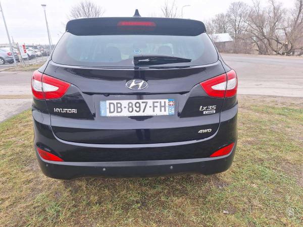 Melns Hyundai ix35 2013 Tauragė, ar dzinēja tilpumu 2.00 L un nobraukumu 210 tūkst. km par 6700 €, foto 6 vietnē AUTOMOTO.COM.LV