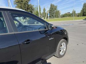 Black Hyundai ix35 2013 in Taurage, with an engine capacity of 1.69 L and mileage of 218 thousand km for 5500 €, photo 10 on AUTOMOTO.COM.LV