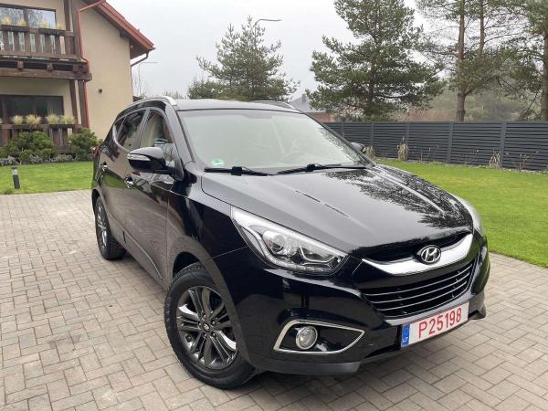 Black Hyundai ix35 2014 in Druskininkai, with an engine capacity of 1.69 L and mileage of 251 thousand km for 6990 €, photo 2 on AUTOMOTO.COM.LV