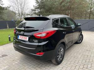 Black Hyundai ix35 2014 in Druskininkai, with an engine capacity of 1.69 L and mileage of 251 thousand km for 6990 €, photo 4 on AUTOMOTO.COM.LV