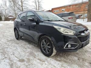 Black Hyundai ix35 2014 in Ukmerge, with an engine capacity of 1.69 L and mileage of 183 thousand km for 6250 €, photo 3 on AUTOMOTO.COM.LV