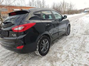 Black Hyundai ix35 2014 in Ukmerge, with an engine capacity of 1.69 L and mileage of 183 thousand km for 6250 €, photo 5 on AUTOMOTO.COM.LV