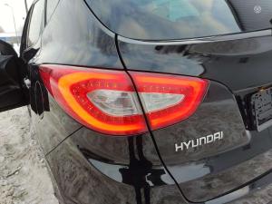 Black Hyundai ix35 2014 in Ukmerge, with an engine capacity of 1.69 L and mileage of 183 thousand km for 6250 €, photo 8 on AUTOMOTO.COM.LV