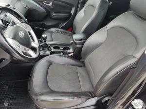 Black Hyundai ix35 2014 in Ukmerge, with an engine capacity of 1.69 L and mileage of 183 thousand km for 6250 €, photo 18 on AUTOMOTO.COM.LV