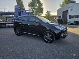 Black Hyundai ix35 2014 in Ukmerge, with an engine capacity of 2.00 L and mileage of 232 thousand km for 7550 €, photo  on AUTOMOTO.COM.LV