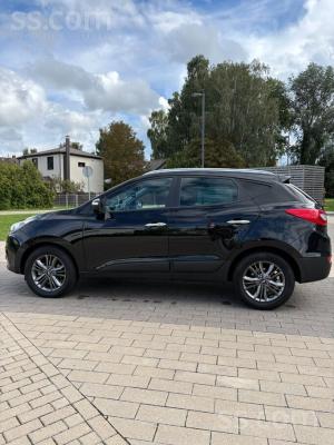 Melns Hyundai ix35 2014 Rīga, ar dzinēja tilpumu 2.00 L un nobraukumu 215 tūkst. km par 7500 €, foto 5 vietnē AUTOMOTO.COM.LV