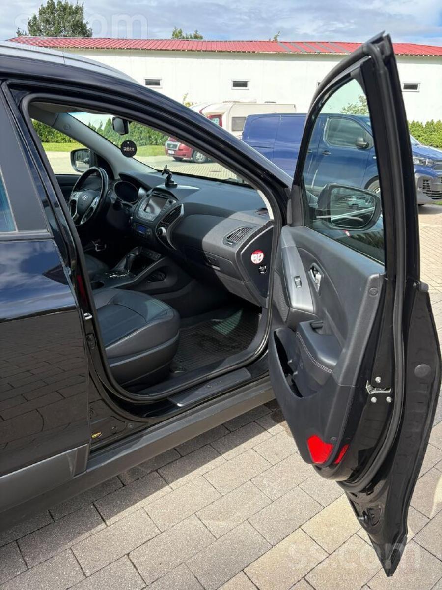 Melns Hyundai ix35 2014 Rīga, ar dzinēja tilpumu 2.00 L un nobraukumu 215 tūkst. km par 7500 €, foto 14 vietnē AUTOMOTO.COM.LV
