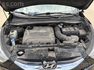 Melns Hyundai ix35 2014 Rīga, ar dzinēja tilpumu 2.00 L un nobraukumu 215 tūkst. km par 7500 €, foto 22 vietnē AUTOMOTO.COM.LV
