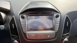 Black Hyundai ix35 2014 in Ukmerge, with an engine capacity of 2.00 L and mileage of 228 thousand km for 6750 €, photo 15 on AUTOMOTO.COM.LV