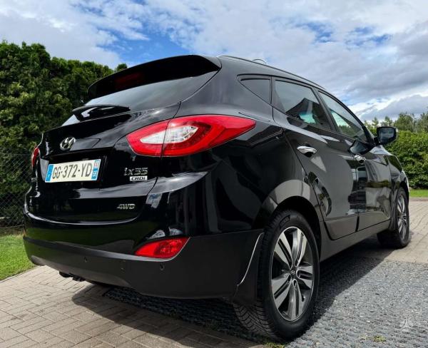 Black Hyundai ix35 2015 in Kaunas, with an engine capacity of 2.00 L and mileage of 194 thousand km for 9350 €, photo 7 on AUTOMOTO.COM.LV