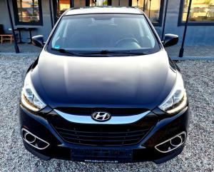 Black Hyundai ix35 2015 in Kretinga, with an engine capacity of 2.00 L and mileage of 189 thousand km for 7650 €, photo 5 on AUTOMOTO.COM.LV