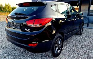 Black Hyundai ix35 2015 in Kretinga, with an engine capacity of 2.00 L and mileage of 189 thousand km for 7650 €, photo 10 on AUTOMOTO.COM.LV