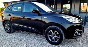 Black Hyundai ix35 2015 in Kretinga, with an engine capacity of 2.00 L and mileage of 189 thousand km for 7650 €, photo 16 on AUTOMOTO.COM.LV