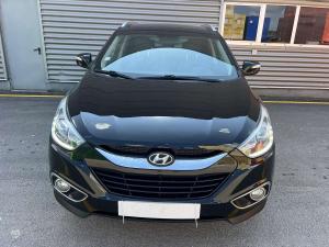 Black Hyundai ix35 2015 in Taurage, with an engine capacity of 1.69 L and mileage of 268 thousand km for 6400 €, photo 4 on AUTOMOTO.COM.LV