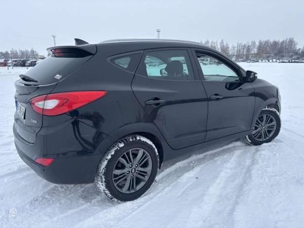 Black Hyundai ix35 2016 in Marijampole, with an engine capacity of 1.69 L and mileage of 274 thousand km for 6250 €, photo 4 on AUTOMOTO.COM.LV