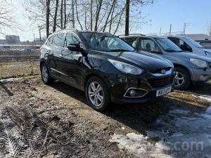 Black Hyundai ix35 2013 in Ogre, with an engine capacity of 1.70 L and mileage of 168 thousand km for 2850 €, photo  on AUTOMOTO.COM.LV