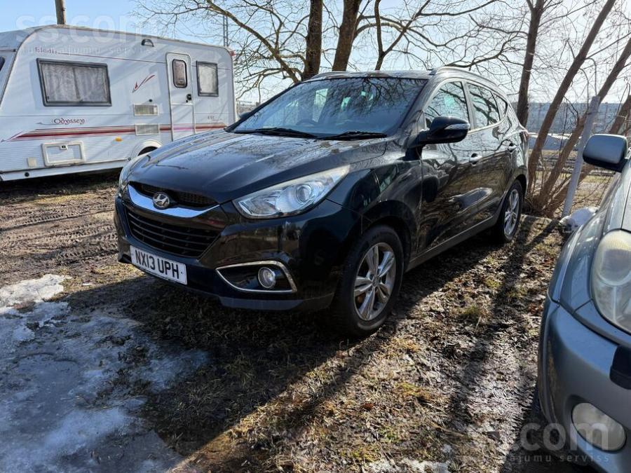Melns Hyundai ix35 2013 Ogre, ar dzinēja tilpumu 1.70 L un nobraukumu 168 tūkst. km par 2850 €, foto 3 vietnē AUTOMOTO.COM.LV