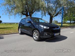 Melns Hyundai ix35 2013 Tallina, ar dzinēja tilpumu 2.00 L un nobraukumu 66 tūkst. km par 5999 €, foto  vietnē AUTOMOTO.COM.LV