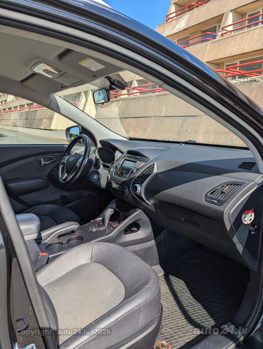 Black Hyundai ix35 2013 in Tallinn, with an engine capacity of 2.00 L and mileage of 66 thousand km for 5999 €, photo 11 on AUTOMOTO.COM.LV