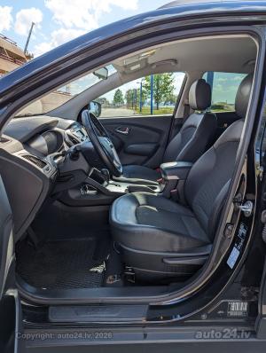 Black Hyundai ix35 2013 in Tallinn, with an engine capacity of 2.00 L and mileage of 66 thousand km for 5999 €, photo 12 on AUTOMOTO.COM.LV