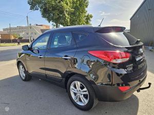 Black Hyundai ix35 2012 in Siauliai, with an engine capacity of 1.60 L and mileage of 197 thousand km for 5950 €, photo 6 on AUTOMOTO.COM.LV