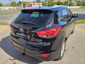 Black Hyundai ix35 2012 in Siauliai, with an engine capacity of 1.60 L and mileage of 197 thousand km for 5950 €, photo 8 on AUTOMOTO.COM.LV