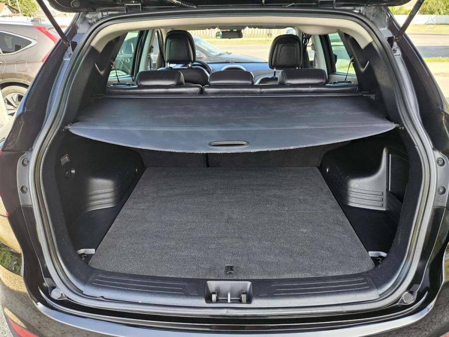 Black Hyundai ix35 2012 in Siauliai, with an engine capacity of 1.60 L and mileage of 197 thousand km for 5950 €, photo 13 on AUTOMOTO.COM.LV